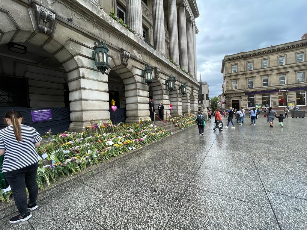 Floral tributes left for The Queen outside Old Market Square in ...