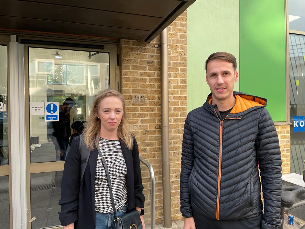 Charlotte Veal, 30, and her partner Harry Palmer, 29, outside their ...