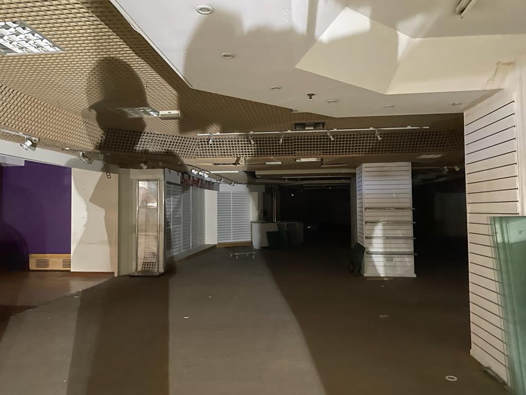An eerie picture shows the inside of the derelict former Beales ...