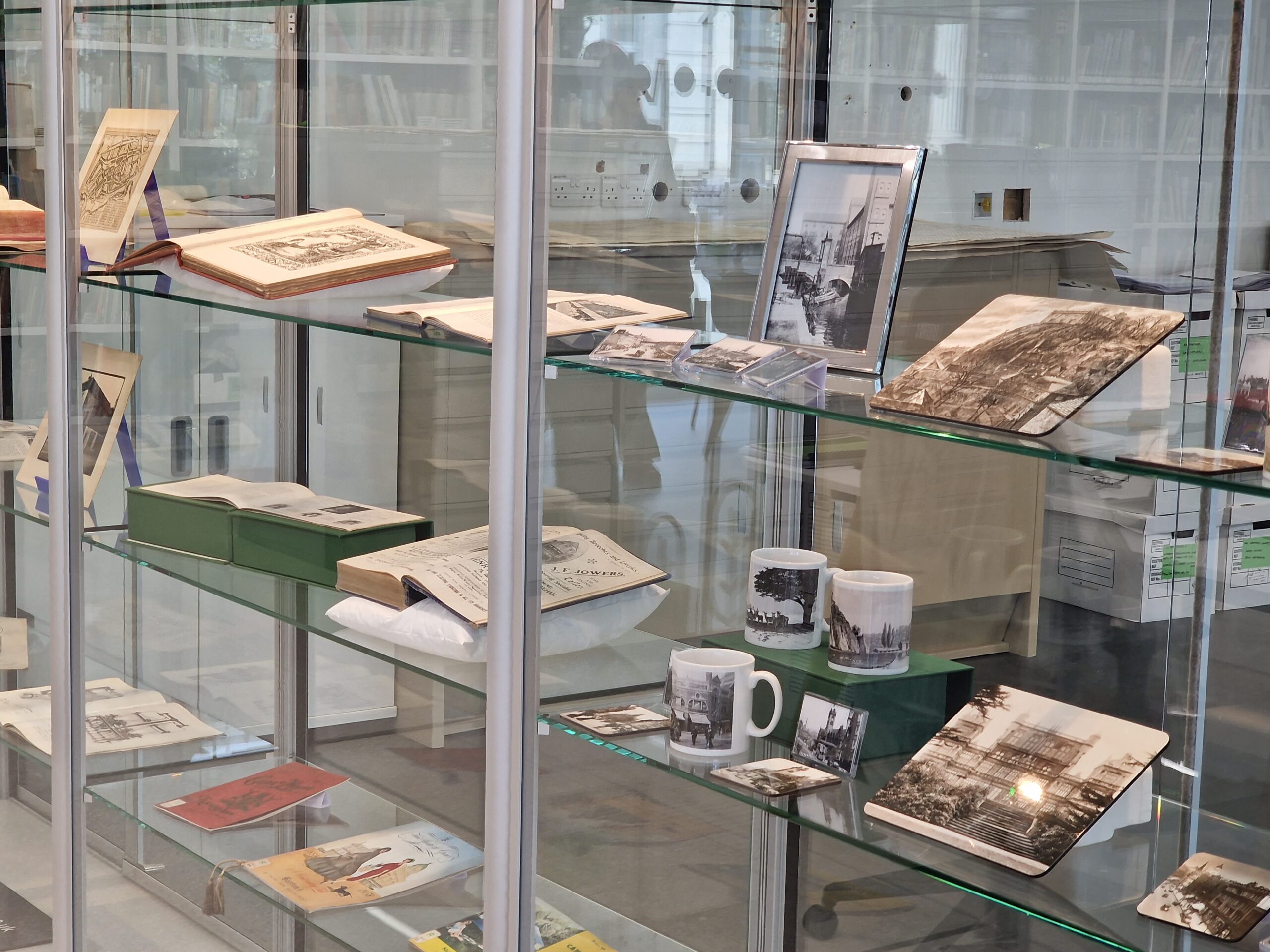 A series of historic books and maps are on display in an exhibition ...