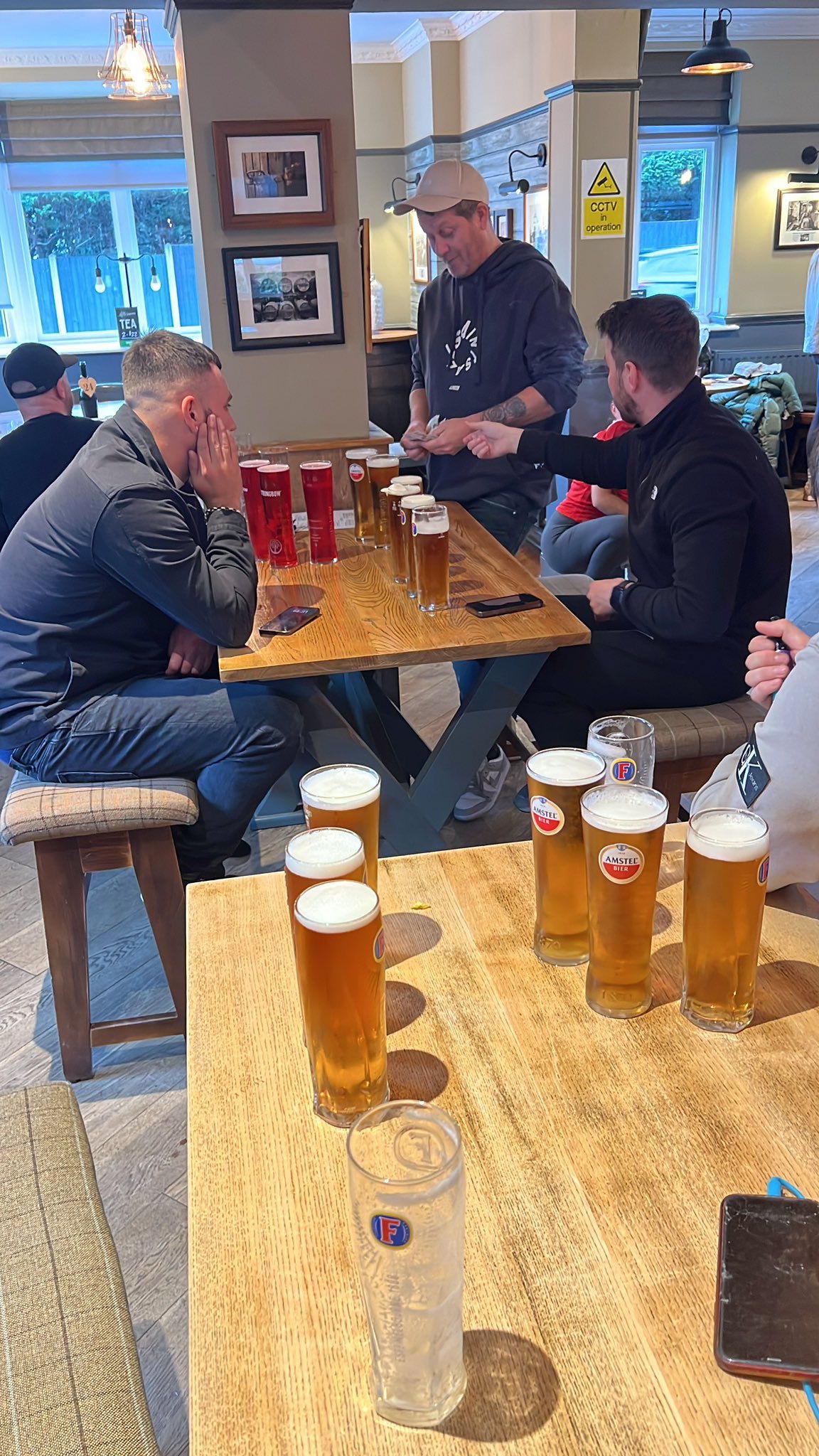 ‘It was like a pitch invasion to the bar’: Inside the pub forced to ...